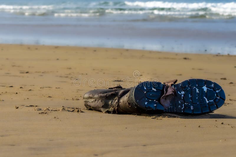 Lost safety boot stock photo. Image of coast, ocean - 219204672