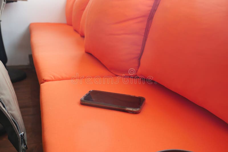 Lost Smart Phone Concept. Smart Phone Left on a Sofa Stock Photo ...