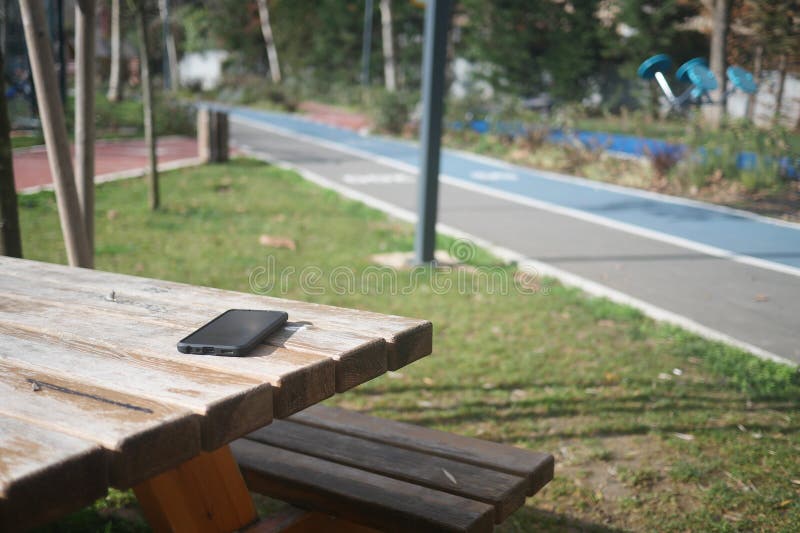 Lost Smart Phone on a Park Bench Stock Image - Image of device, mobile ...