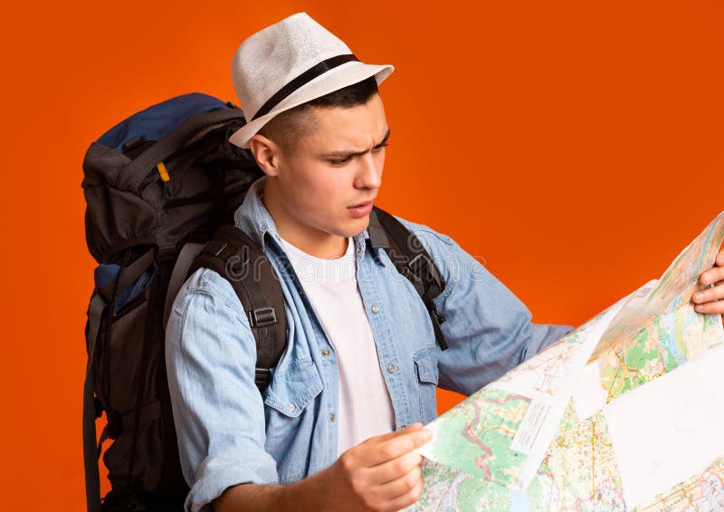 Lost Traveler with Backpack Looking at City Map Stock Image - Image of ...