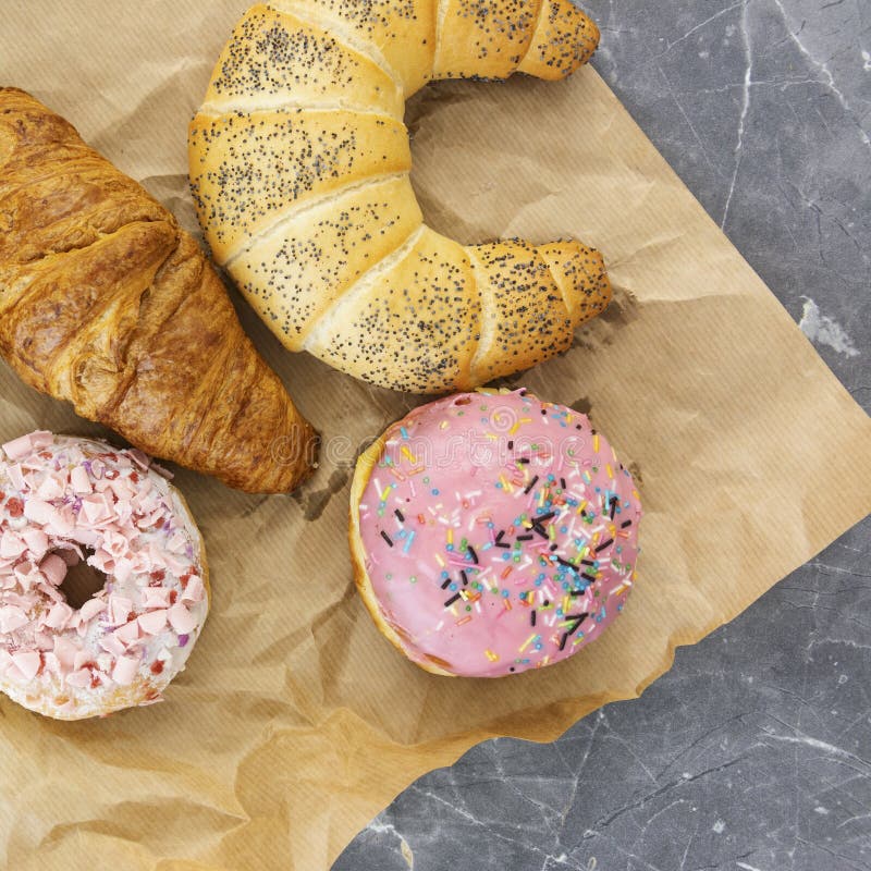 A Lot of Baked Sweets on Concrete Table Stock Photo - Image of ...