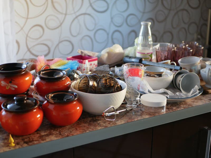 A Lot of Different Dishes on the Table. the Mess on the Table Stock ...