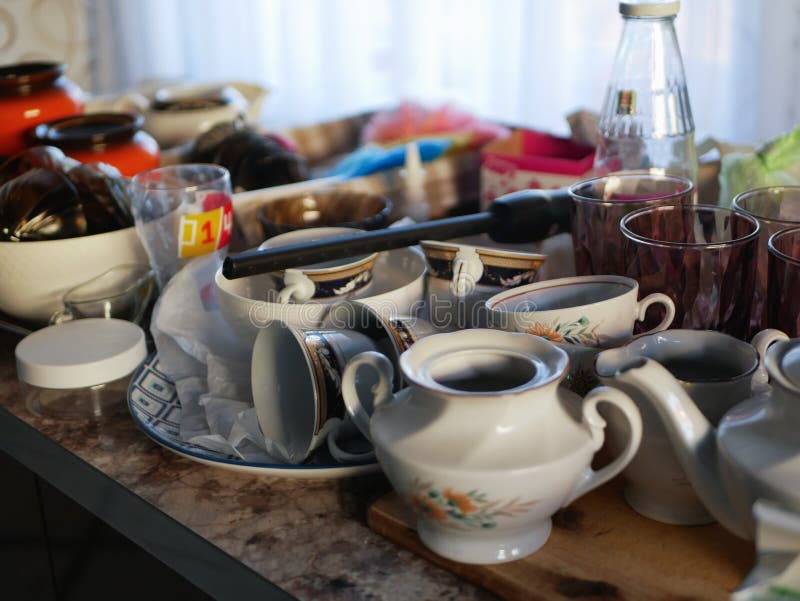 A Lot of Different Dishes on the Table. the Mess on the Table Stock ...