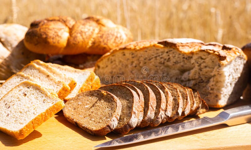 Lot of Different Flavored Bread, Wheat, Rye, on the Table in the Field ...