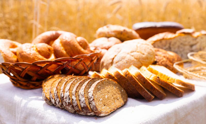 Lot of Different Flavored Bread, Wheat, Rye, on the Table in the Field ...