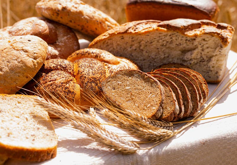 Lot of Different Flavored Bread, Wheat, Rye, on the Table in the Field ...
