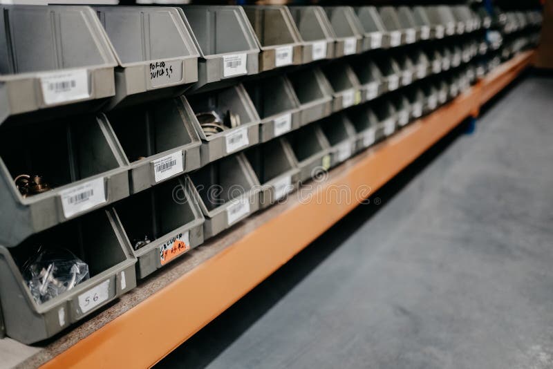 Lot of Empty Storage Bins with Price Tags in a Store Stock Image ...