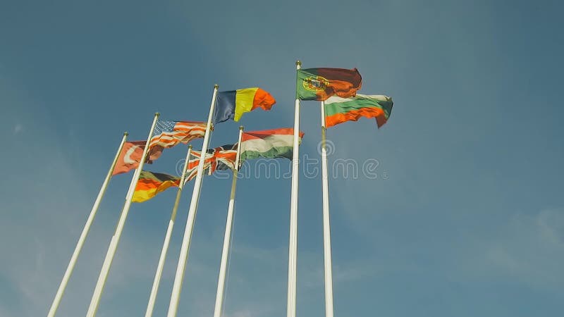 A Lot of Flags of Different Countries are Fluttering in the Wind in ...