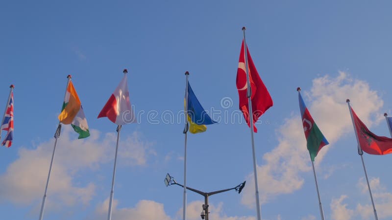 A Lot of Flags of Different Countries are Fluttering in the Wind Stock ...