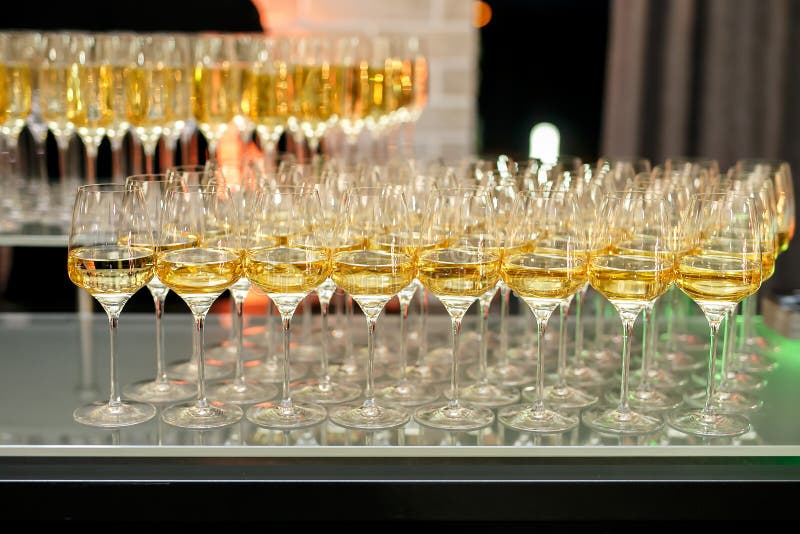 A Lot of Glasses with Champagne or White Wine at the Event Catering ...