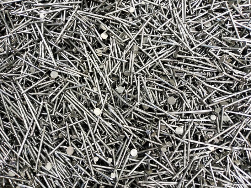 A Lot of Iron Nails Top View for Background Stock Image - Image of ...