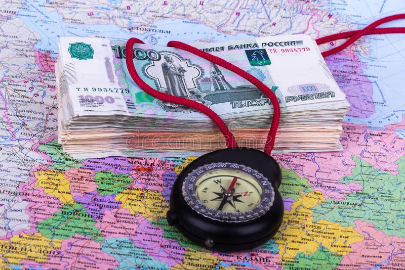 A Lot of Money, a Compass and a Map Stock Photo - Image of plan ...