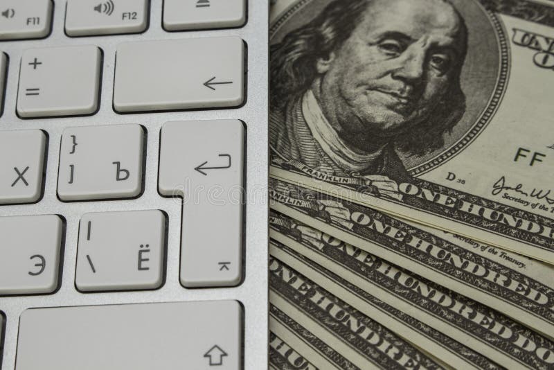 A Lot of Money on a Computer Keyboard Stock Image - Image of keyboard ...