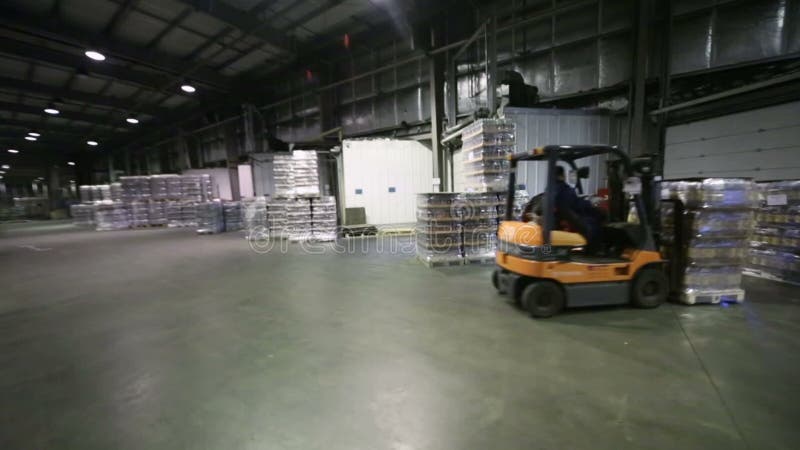 Lot of Packaged Beer Bottles in Large Warehouse Stock Footage - Video ...