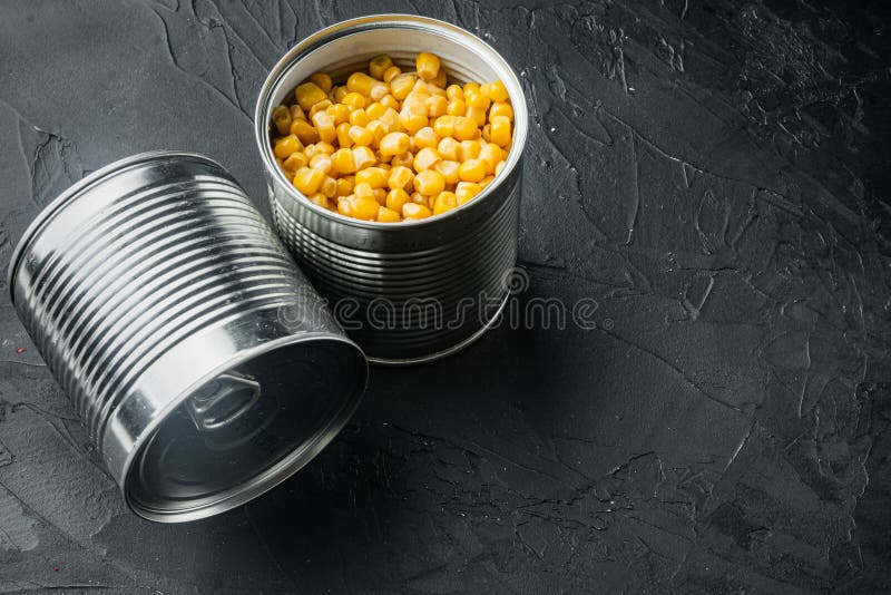 Lot of Pieces of Canned Yellow Corn in Metall Can, on Black Background ...