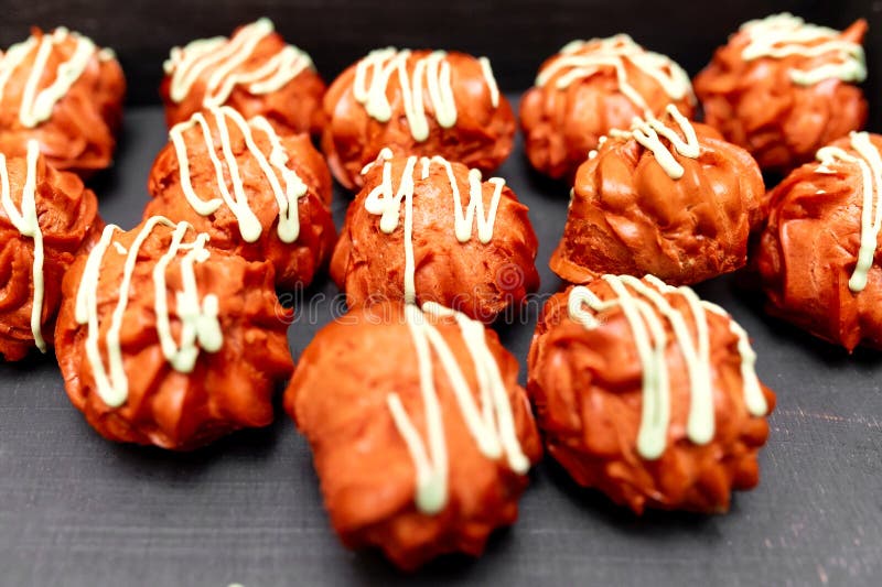 A Lot of Red Balls Cakes with White Icing Stock Image - Image of ...