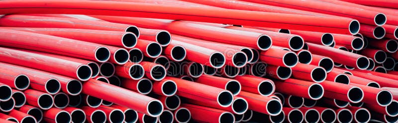 Lot of Red Plastic Pipes for Laying and Protecting the Electrical Cable ...