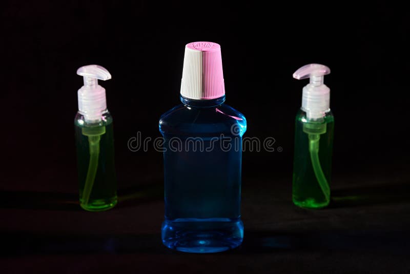 Lot of Sanitizer Hand Antiseptics. Dark Background Stock Image - Image ...