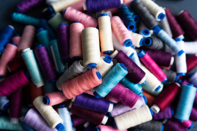 A Lot of Sewing Colored Thread. Thread Reels. Colorful Threads in the ...