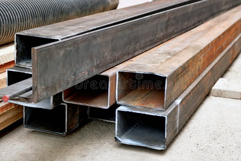 A Lot of Steel Channels for Construction Lies on the Construction Site ...