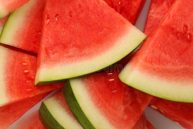 Triangle Slices of Fresh and Juicy Watermelon on White Plate Stock ...