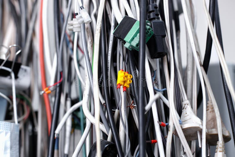 A Lot of Used Electrical Wires Hang Together. Background Stock Photo ...