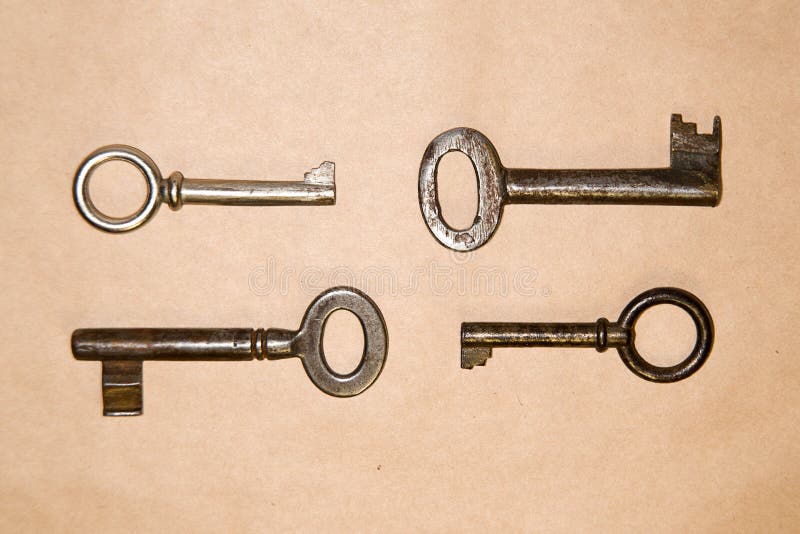 A Lot Vintage Keys from the Locks on Craft Paper Stock Photo - Image of ...