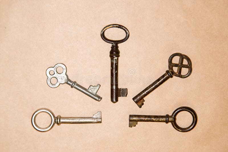A Lot Vintage Keys from the Locks on Craft Paper Stock Image - Image of ...