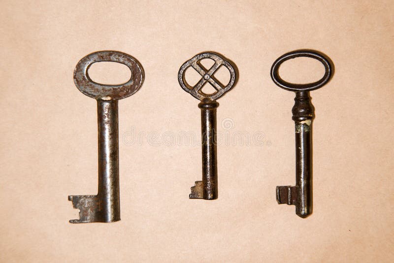 A Lot Vintage Keys from the Locks on Kraft Paper Stock Image - Image of ...