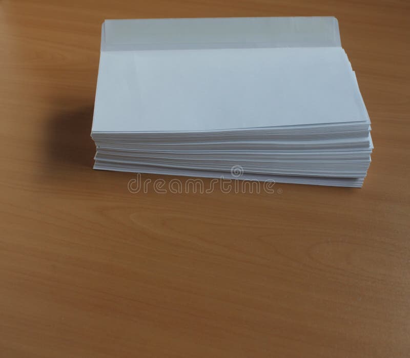 A Lot of White Envelopes on a Wooden Table Stock Image - Image of mail ...