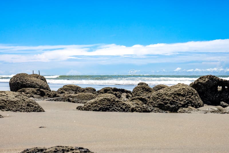 Lots of Big Rocks on a Sea Beach Under the Bright Blue Sky Stock Photo ...