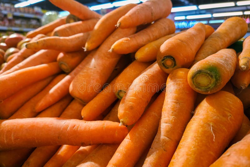 Lots of Carrots Stacked on Display at Groceries Stock Photo - Image of ...