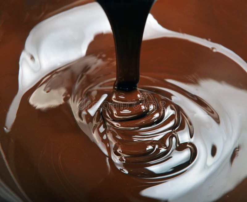 Lots of chocolate falling stock photo. Image of pouring - 98853954