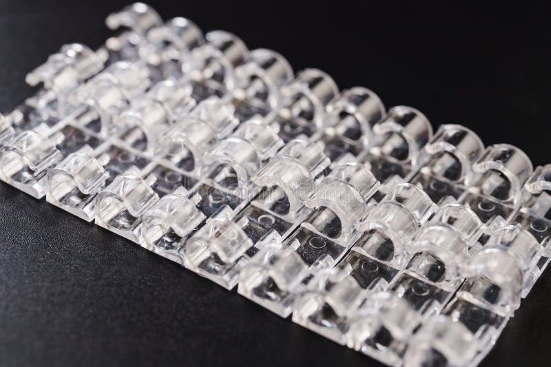 Lots Clear Plastic Wire Holders Black Surface Stock Photos - Free ...
