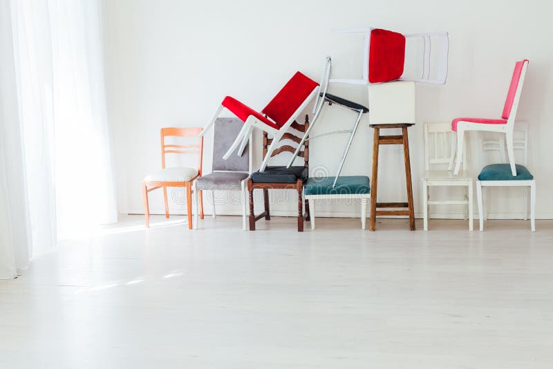 Lots of Different Chairs in the Interior of the White Room Stock Image ...