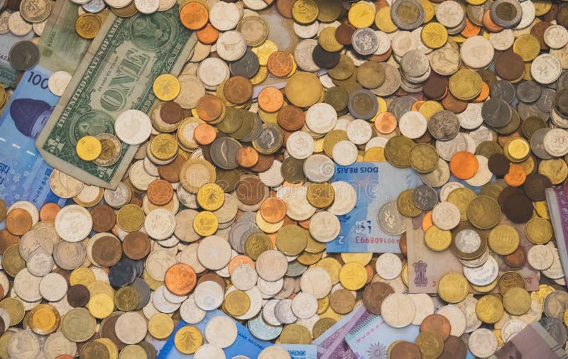 Banknotes and coins. stock image. Image of denominations - 126564257