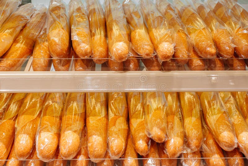 Lots of Fresh Loaves of Bread on Shelves Stock Image - Image of golden ...