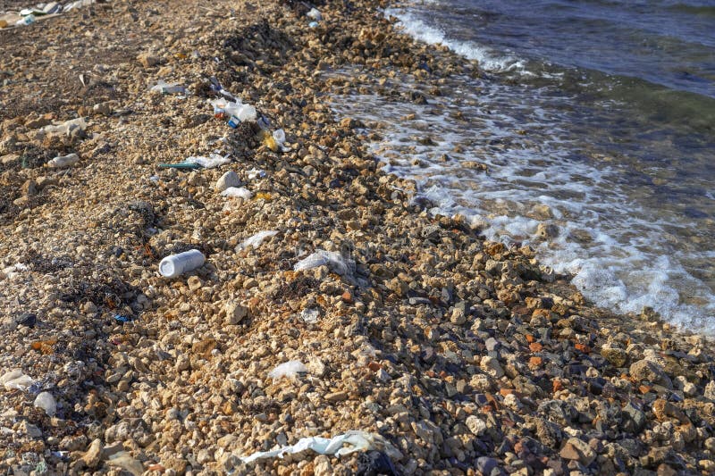 Lots of Garbage by the Sea. Plastic Bottles and Other Garbage Up on ...