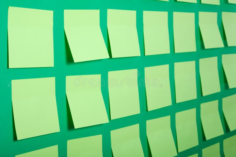 Many Light Green Sticky Notes on a Green Background, Selective Focus ...