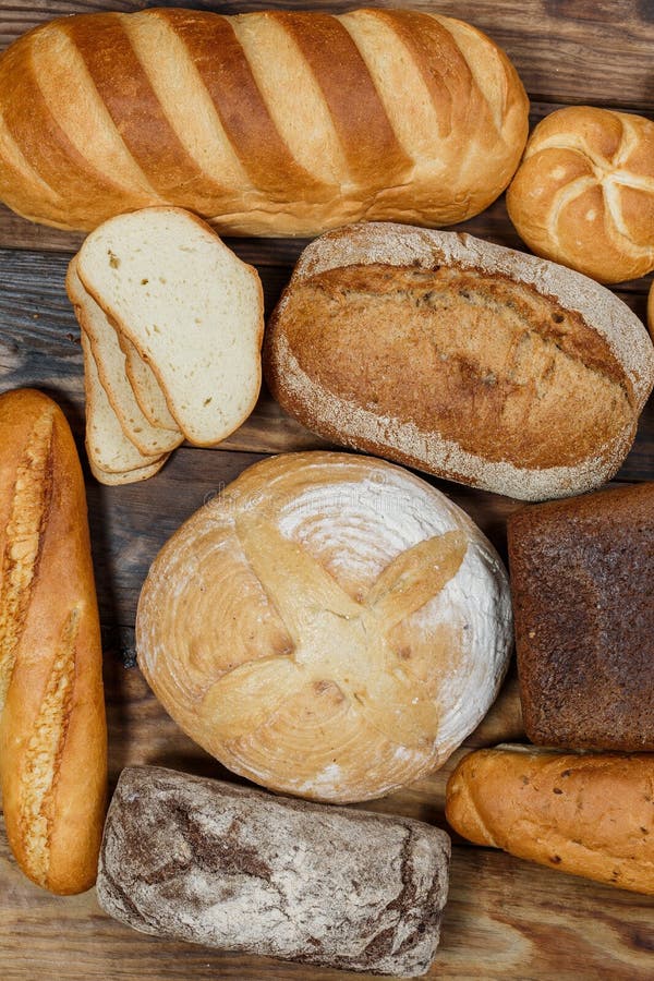 Lots of Loaves of Fresh Bread and Different Ingredients. Bread and ...