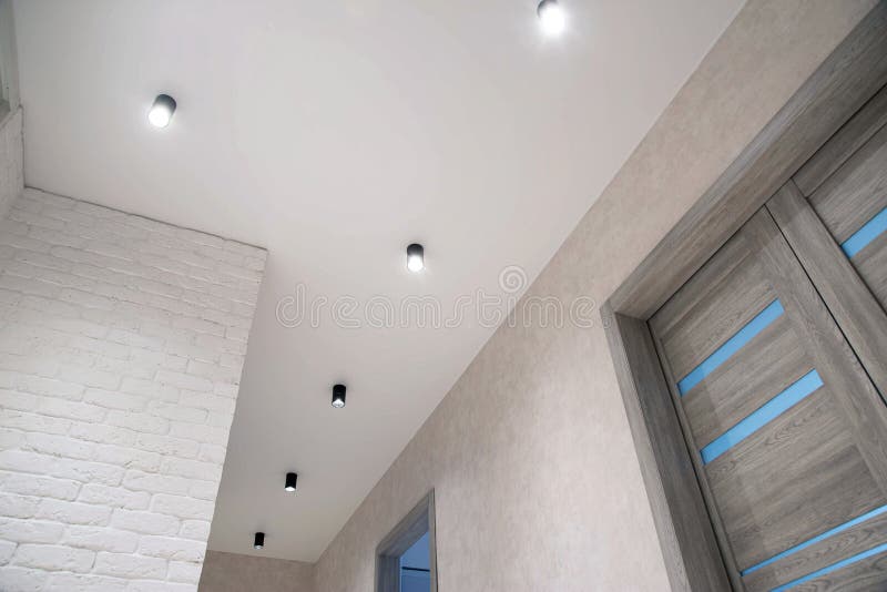 Lots of Modern LED Spotlights on the Stretch Ceiling in the Hallway ...