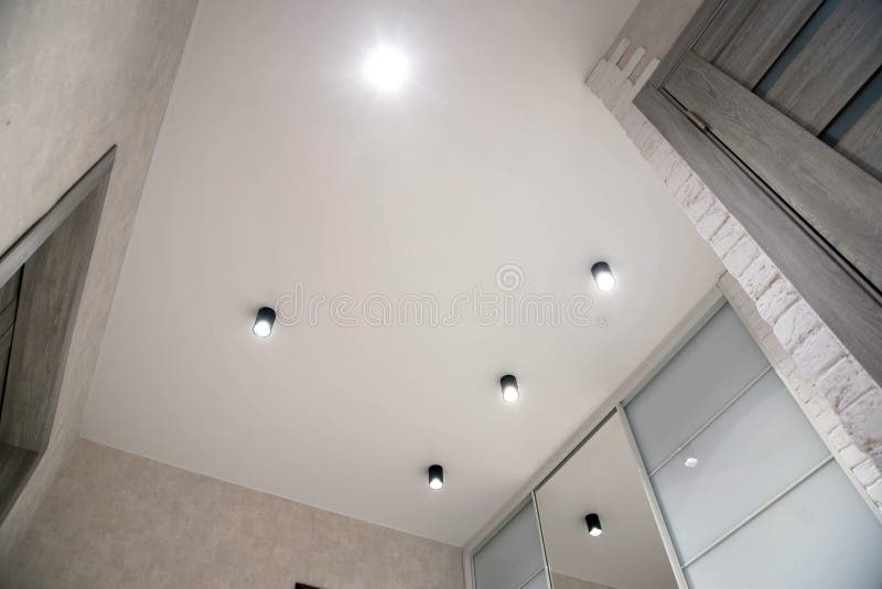Lots of Modern LED Spotlights on the Stretch Ceiling in the Hallway ...