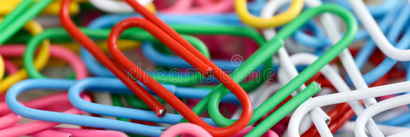 Lots of Multi-colored Paper Clips of Same Size on Table. Stock Photo ...