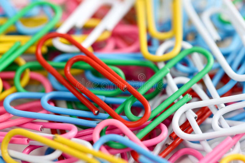 Lots of Multi-colored Paper Clips of Same Size on Table. Stock Photo ...