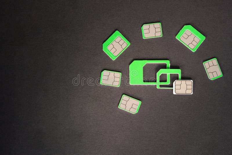 Nano Sim Card Extract from Sim Card Adaptor on Dark Background Stock ...