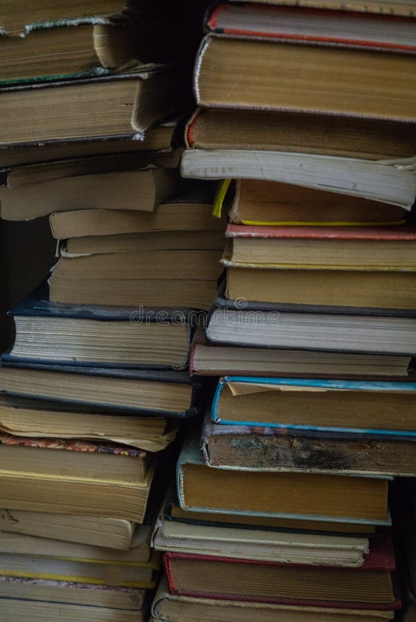 Lots of Old Books Stacked by the Wall Stock Photo - Image of education ...