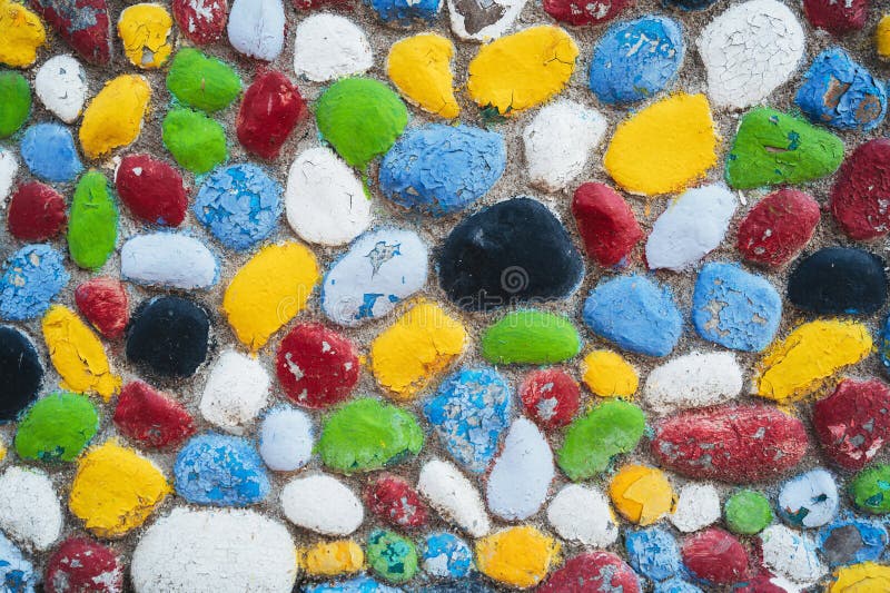 Lots of Pebbles and Stones Painted in Different Colors. Stock Photo ...
