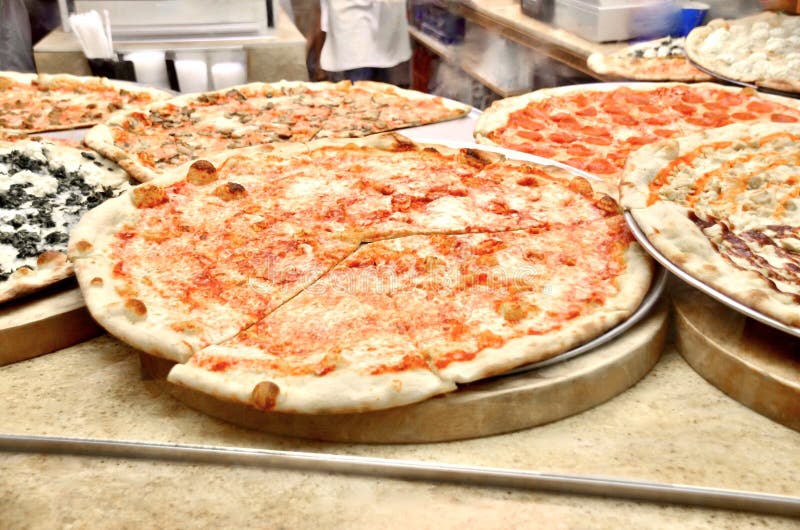 Lots of Pizzas stock image. Image of toppings, pizza - 273380773