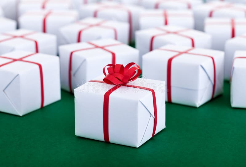 Lots of Presents in White Gift Boxes - on Green Surface Stock Photo ...