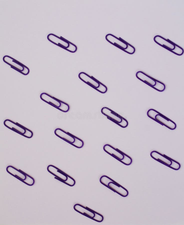 Lots of Purple Paper Clips on Colored Paper Stock Photo - Image of ...